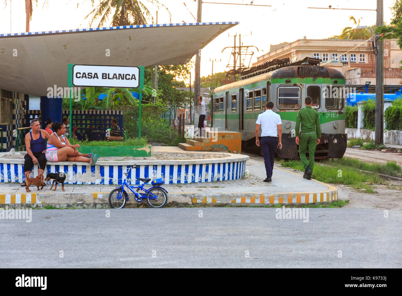 People at Casa Blanca train station with the Hershey Train in Havana ...