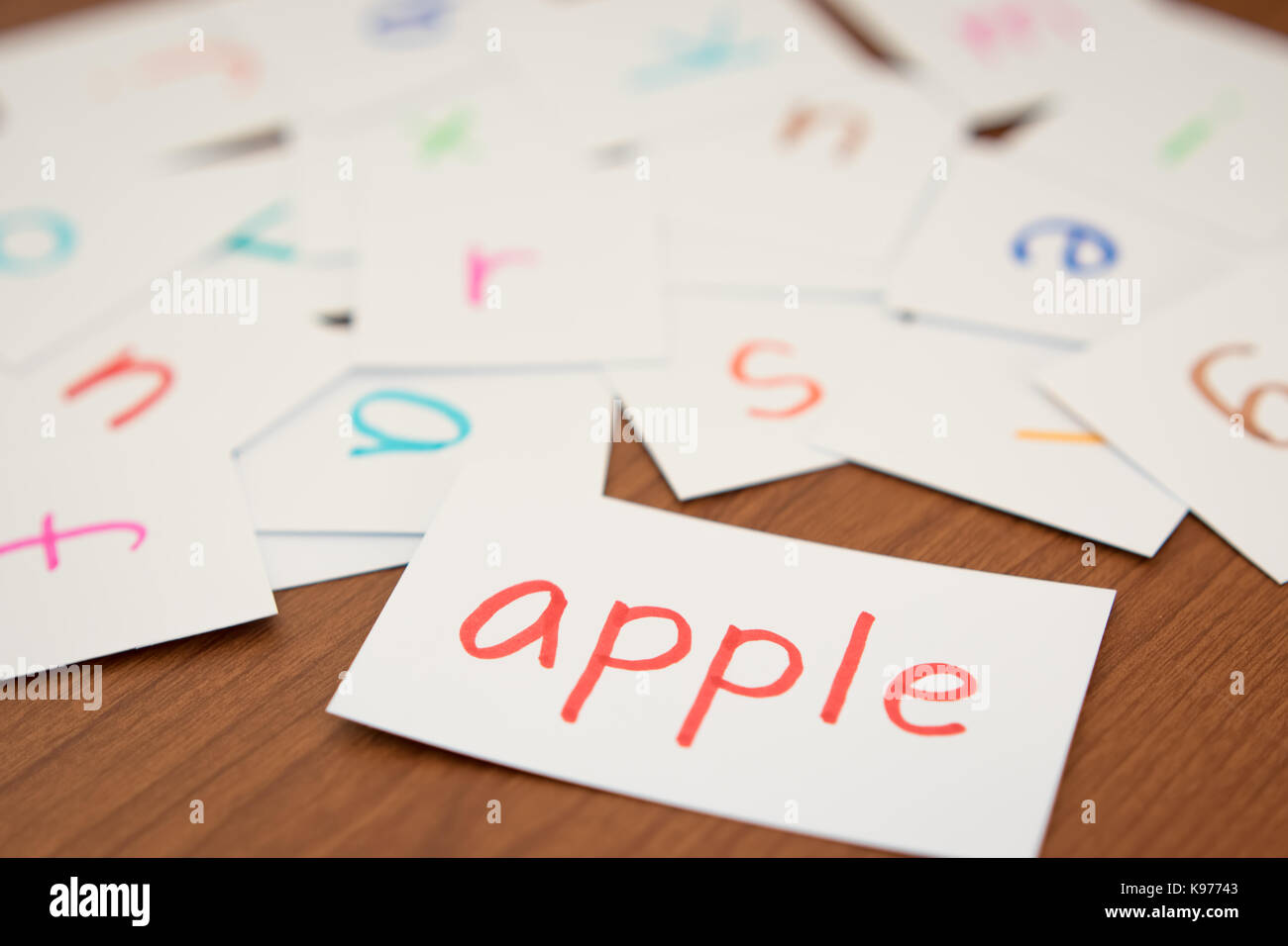 English; Learning the New Word with the Alphabet Cards Stock Photo - Alamy