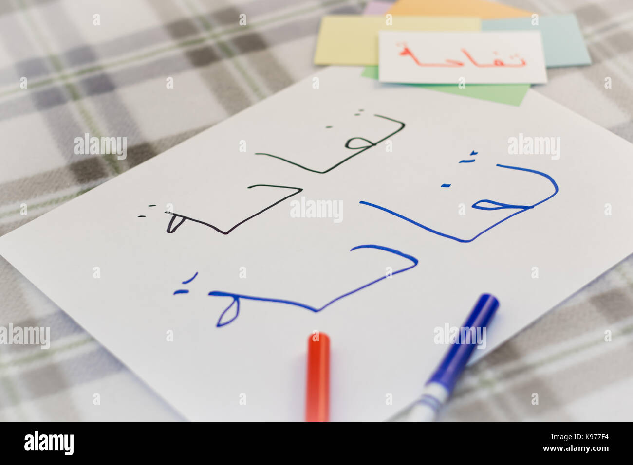 Arabic; Kids Writing Name of the Fruits for Practice (Translation ...