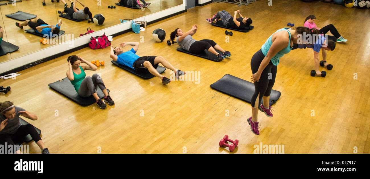 Shots of people at the Gym working out Stock Photo - Alamy