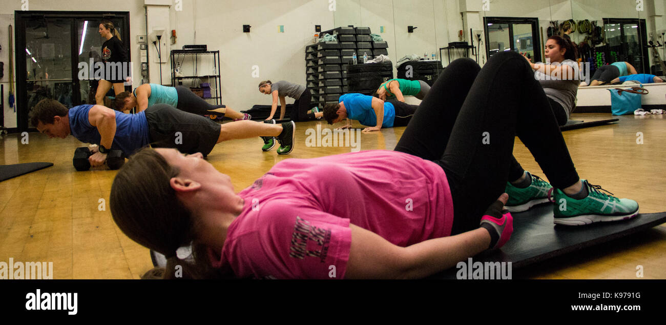 Shots of people at the Gym working out Stock Photo - Alamy