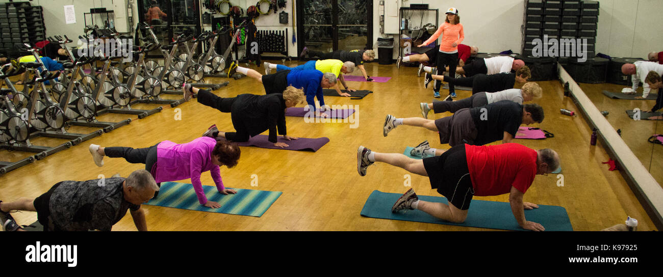 Shots of people at the Gym working out Stock Photo - Alamy
