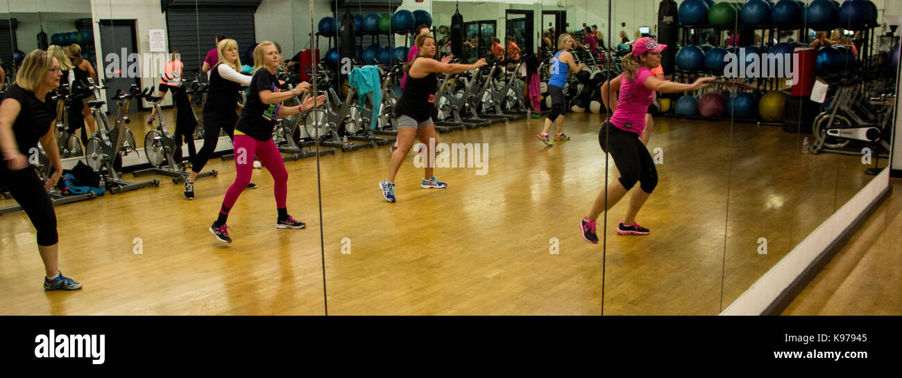 Shots of people at the Gym working out Stock Photo - Alamy