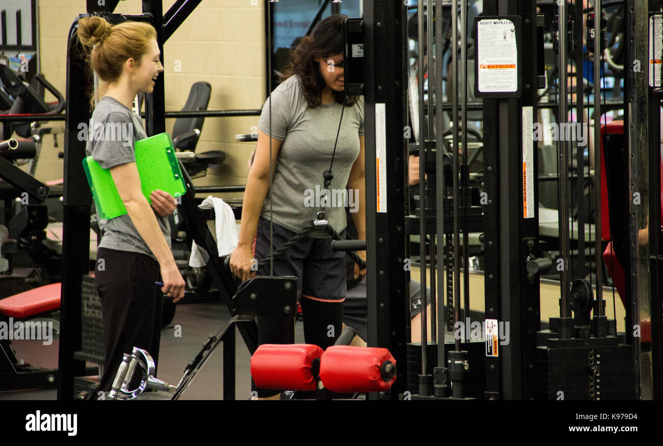 Shots of people at the Gym working out Stock Photo - Alamy