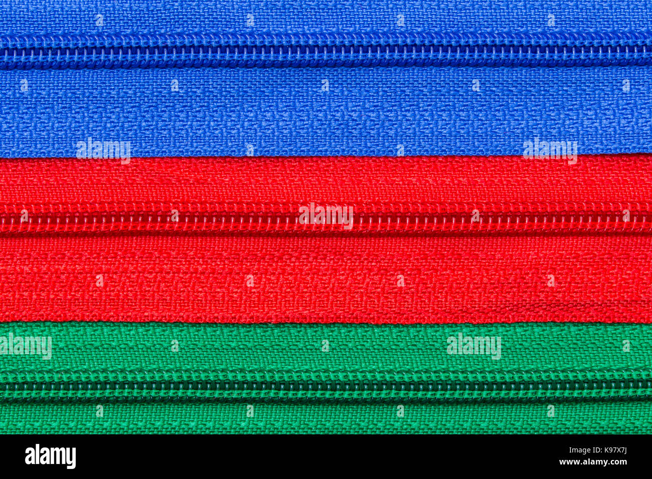 Close up of colorful and many zipper for tailoring Stock Photo - Alamy