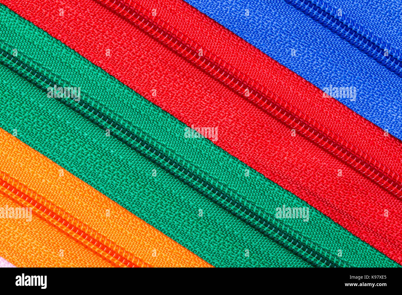 Close up of colorful and many zipper for tailoring Stock Photo - Alamy