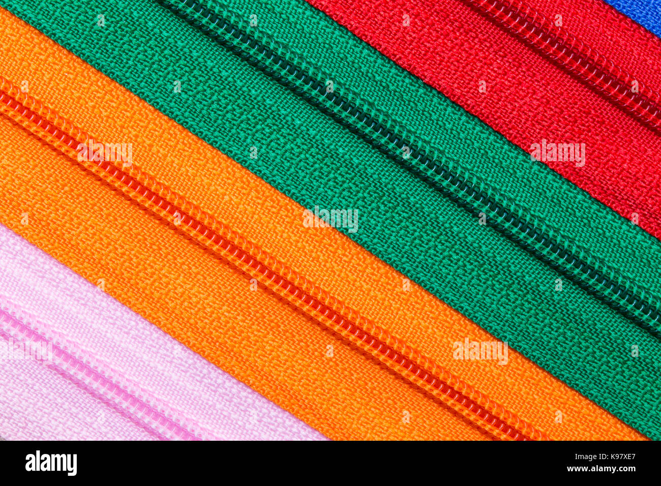 Close up of colorful and many zipper for tailoring Stock Photo - Alamy