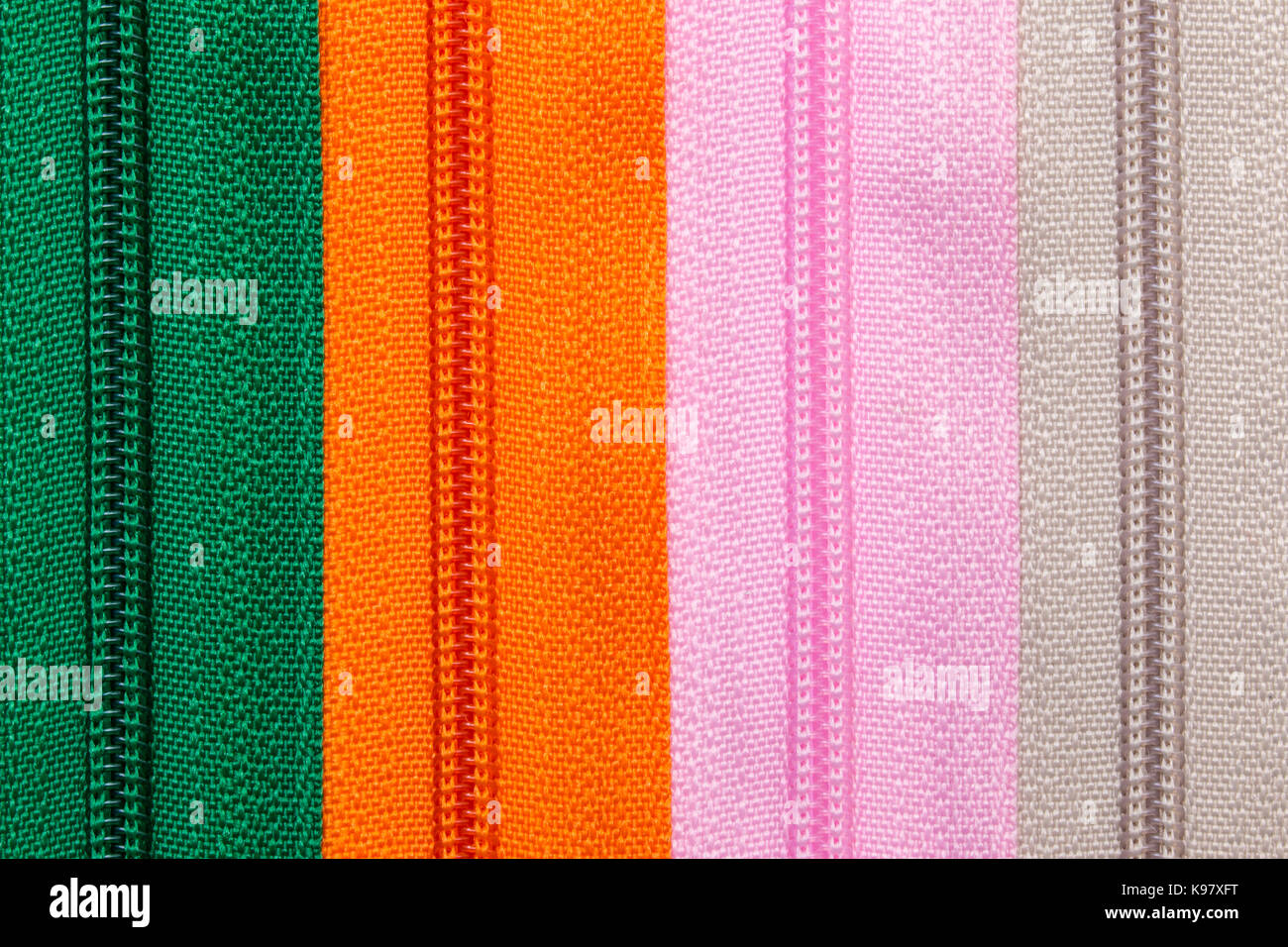 Close up of colorful and many zipper for tailoring Stock Photo - Alamy