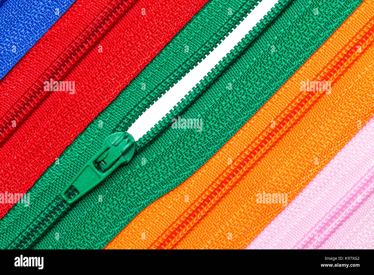Close up of colorful and many zipper for tailoring Stock Photo - Alamy