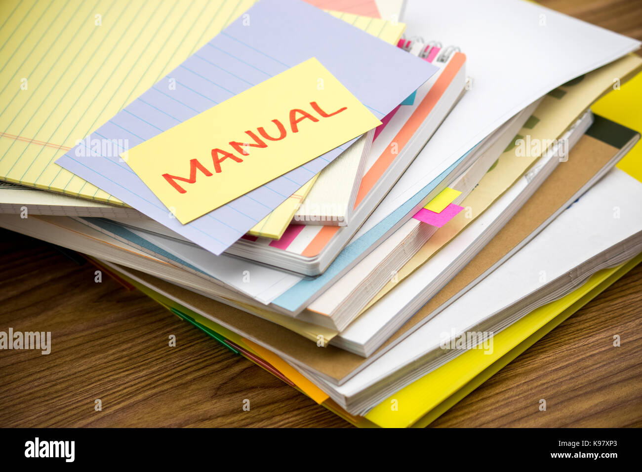 Manual; The Pile of Business Documents on the Desk Stock Photo - Alamy