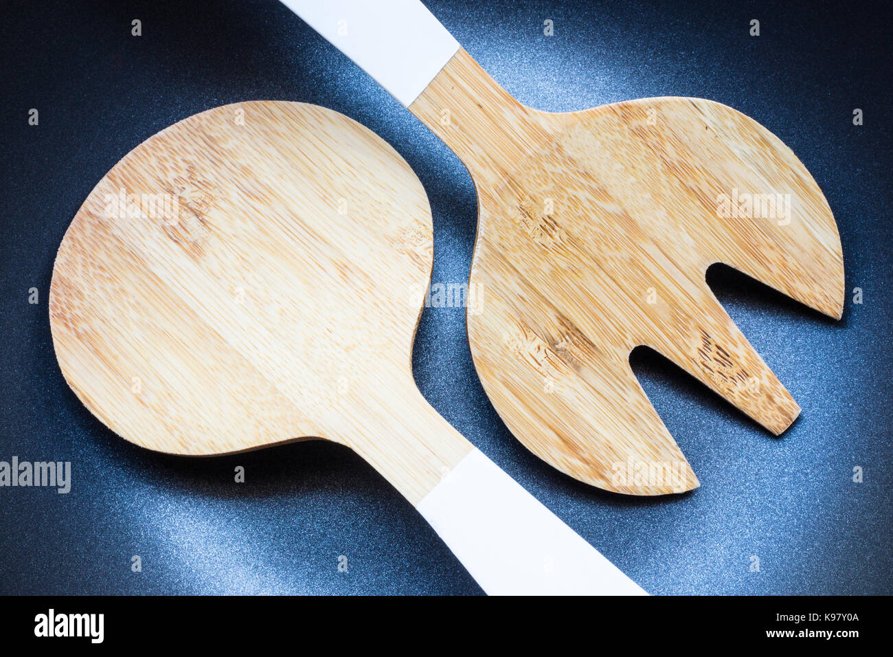 Close up of wooden spatula on coating pan background Stock Photo - Alamy