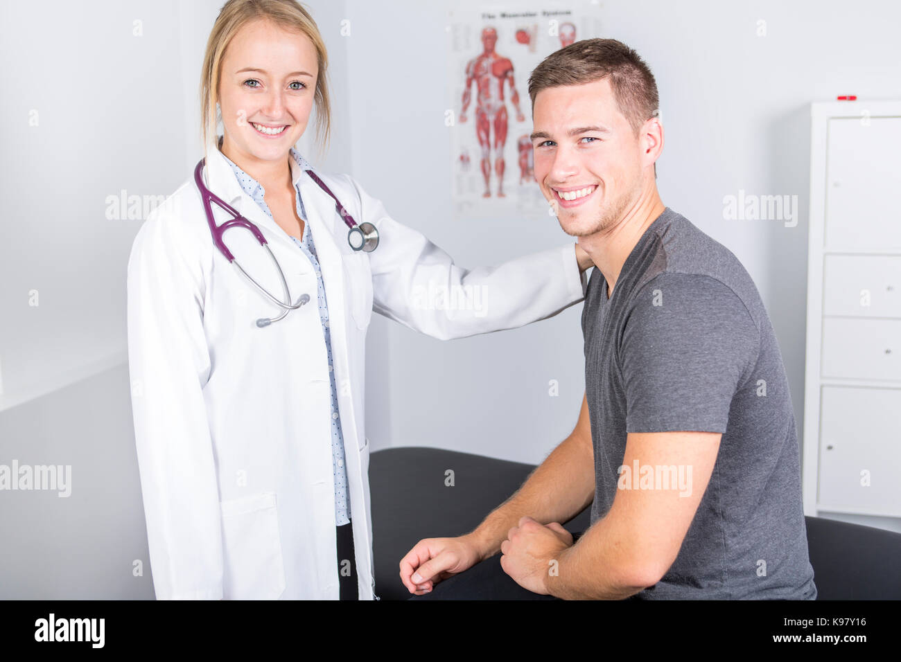 Doctor examining her patient in medical office Stock Photo - Alamy