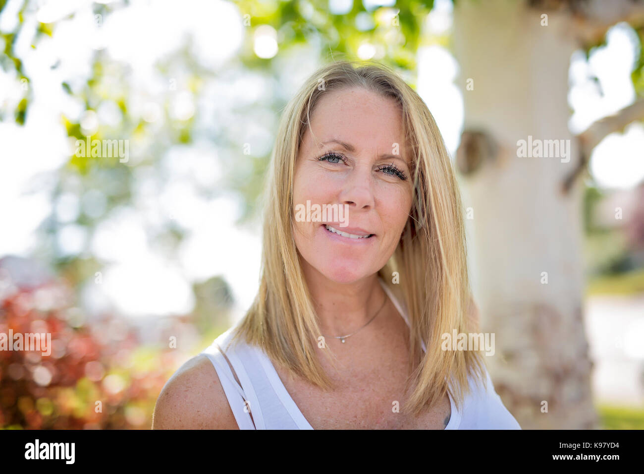 Portrait of woman outdoors Stock Photo - Alamy