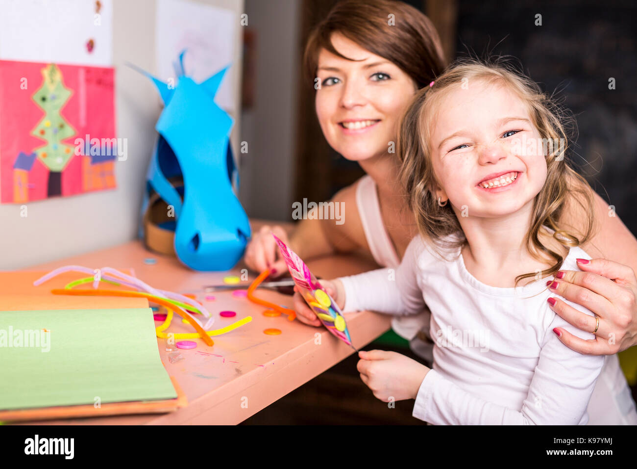 Young Girl use his imagination with cardboard Stock Photo - Alamy