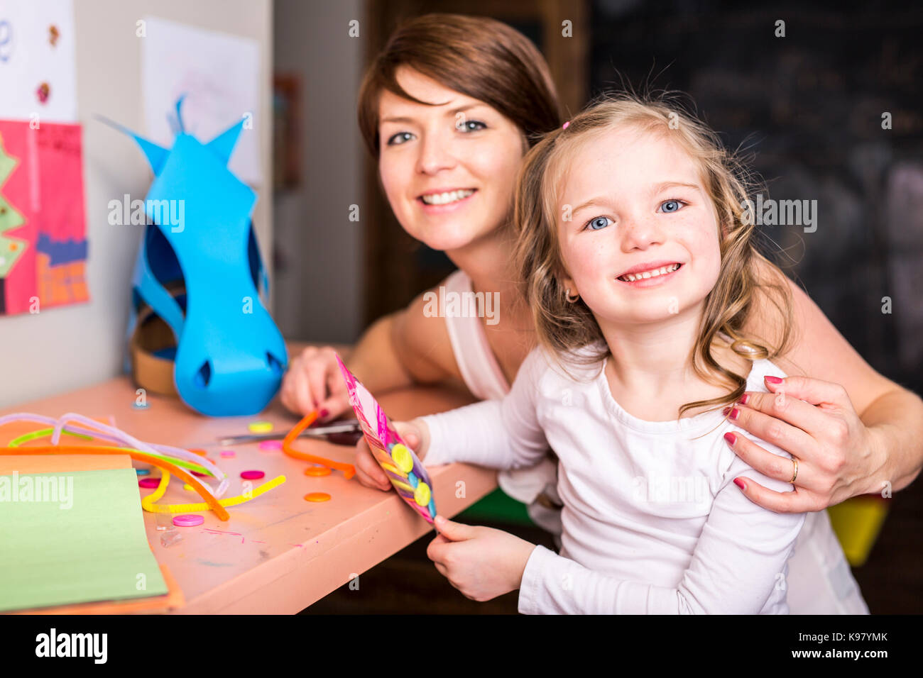 Young Girl use his imagination with cardboard Stock Photo - Alamy