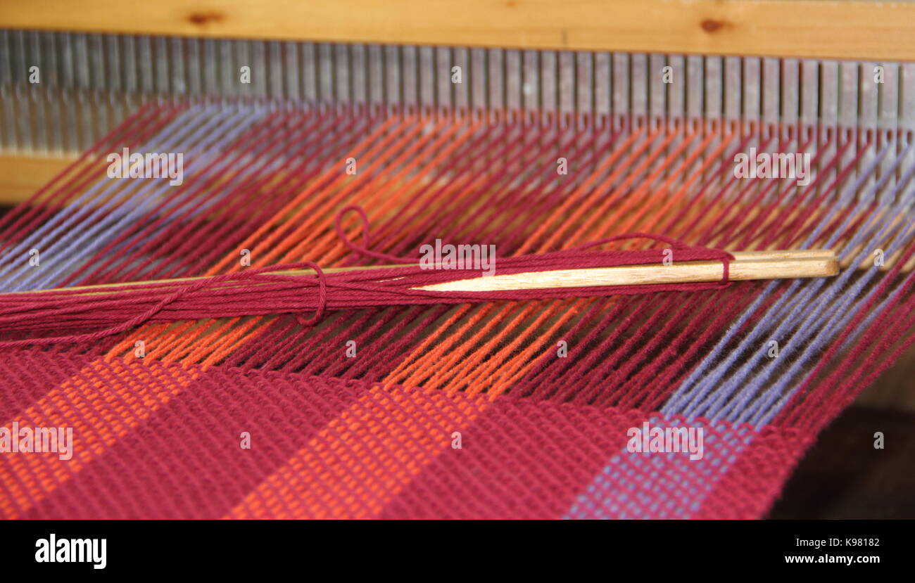 looms, loom fittings, woven scarves, colored yarns white backgrounds ...