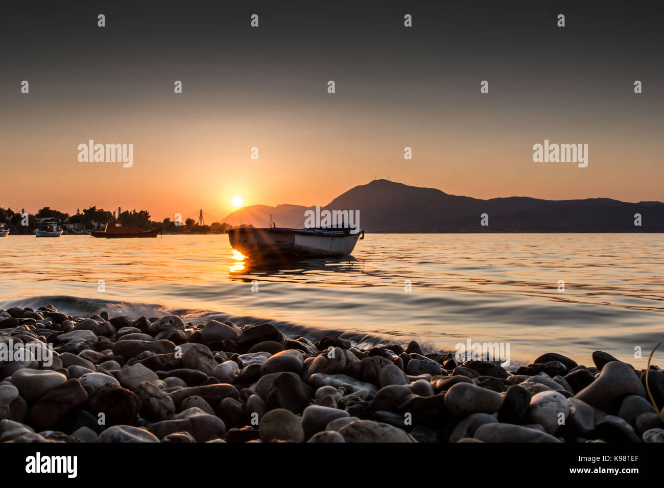 Beautiful sunset at Rio Patras Stock Photo - Alamy