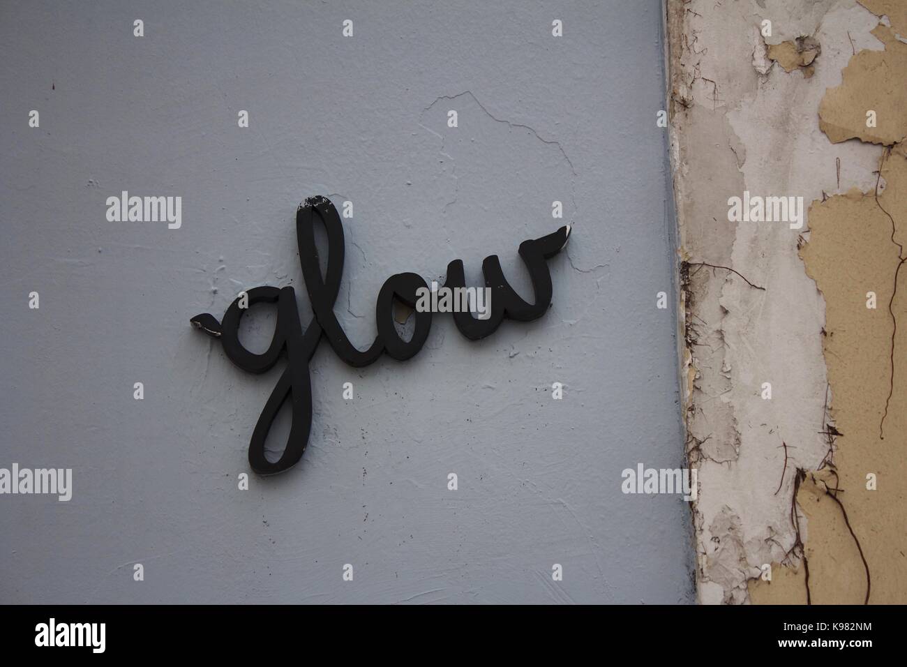 Sign on the wall Stock Photo - Alamy