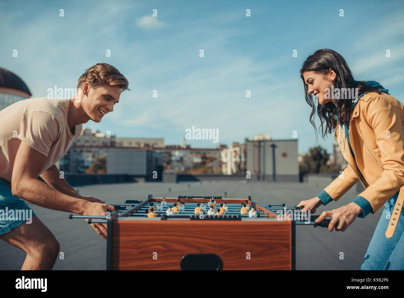 couple playing table football Stock Photo - Alamy
