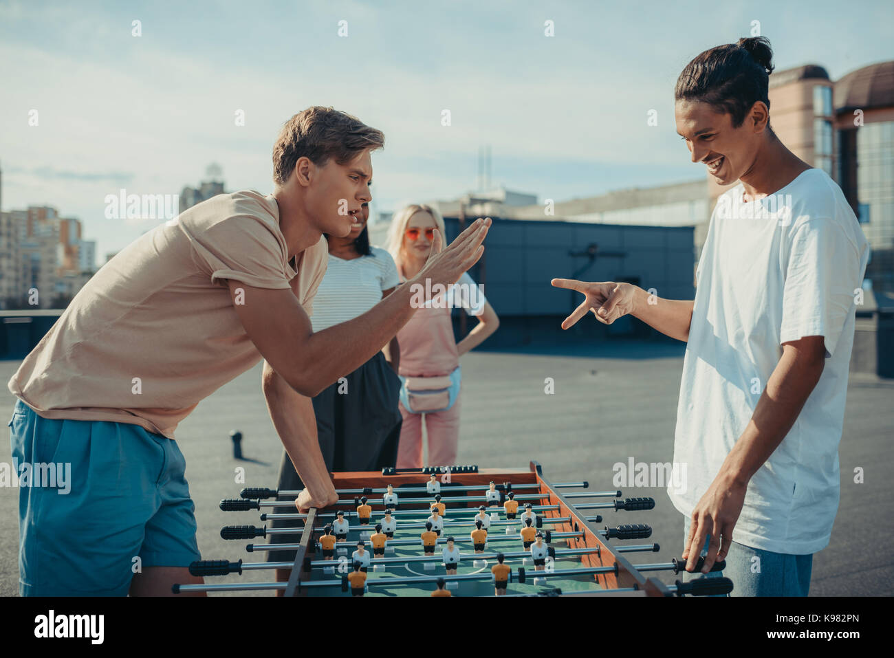 men playing rock-paper-scissors Stock Photo - Alamy