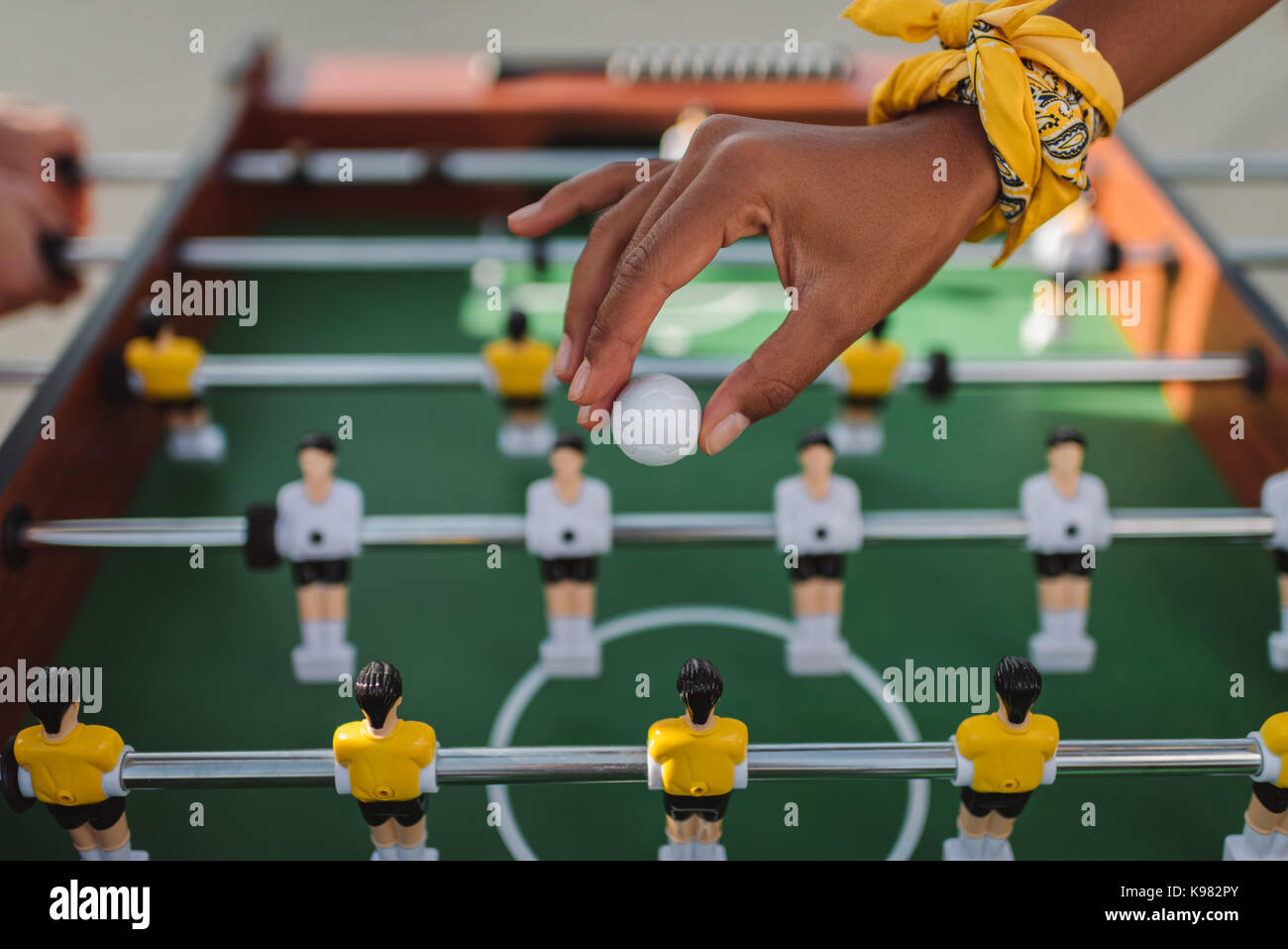 Hand and foosball table hi-res stock photography and images - Alamy
