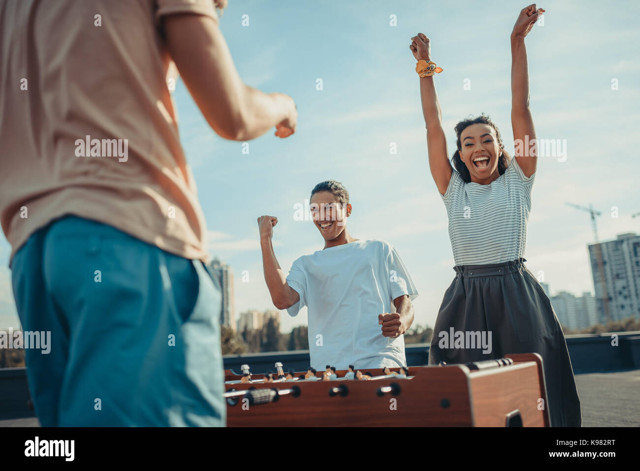 couple celebrating victory in kicker Stock Photo - Alamy