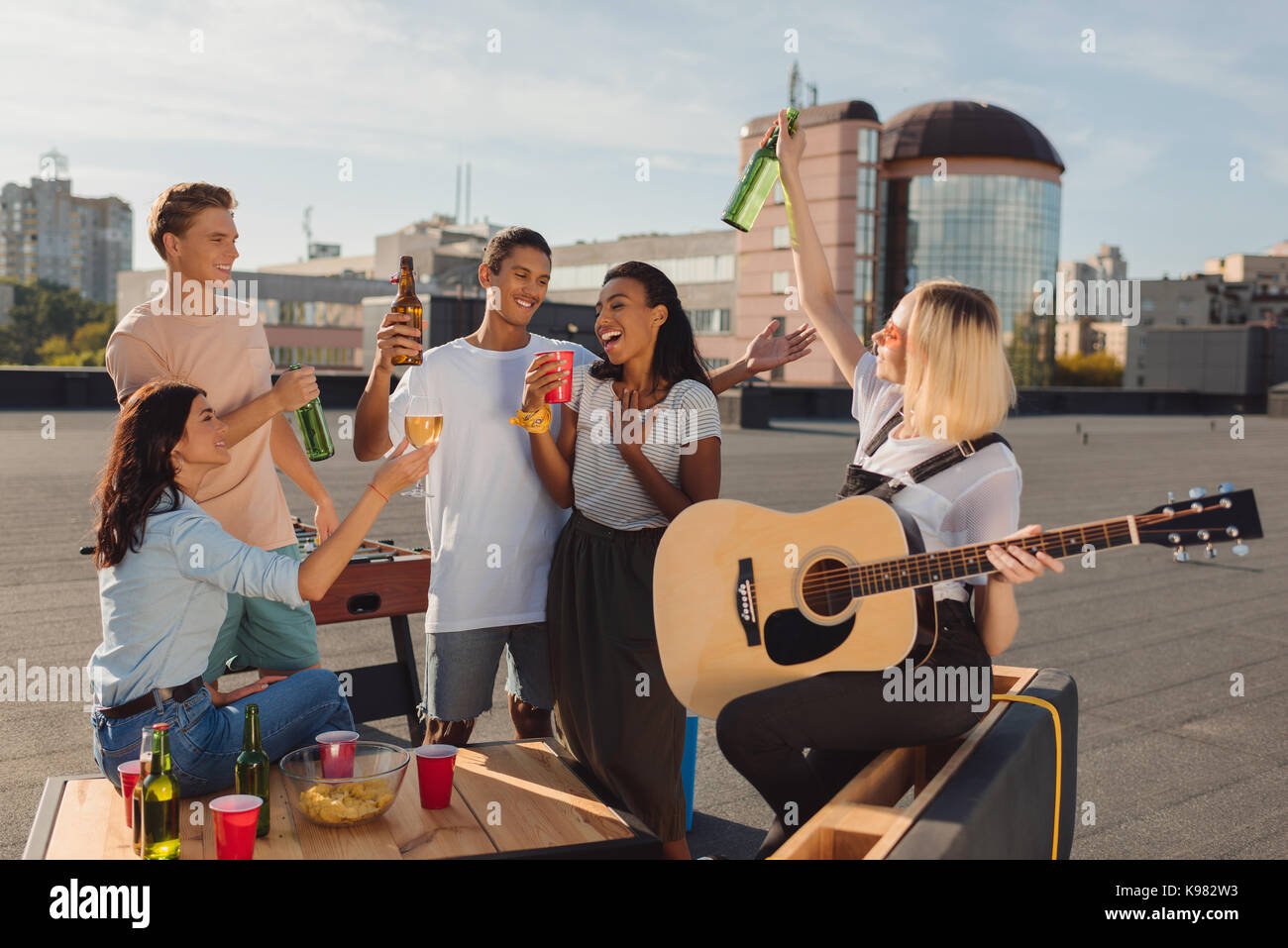 Happy group young friends play hi-res stock photography and images - Alamy