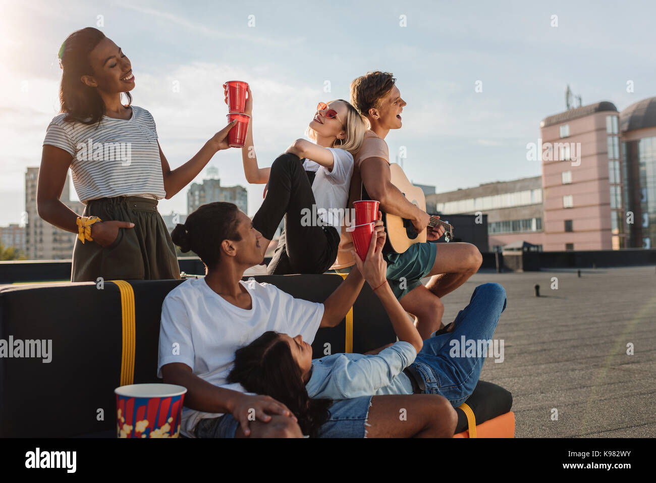 Happy group young friends play hi-res stock photography and images - Alamy