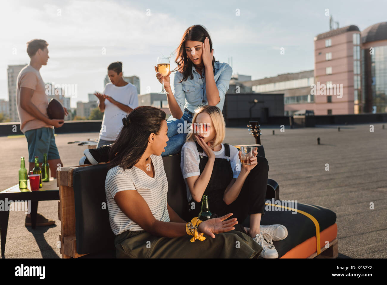 friends having party on roof Stock Photo - Alamy