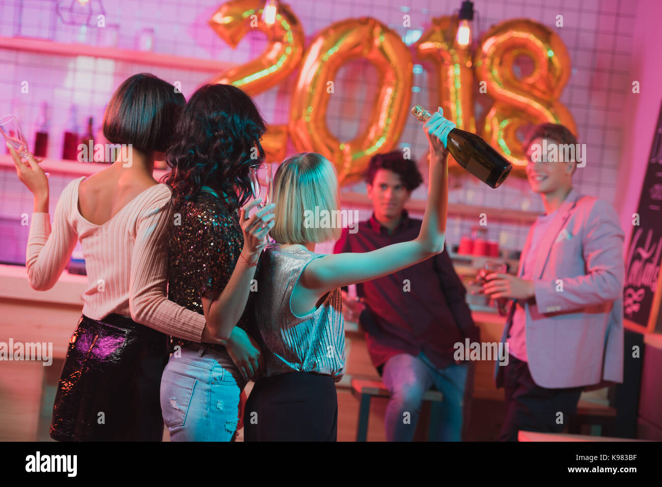 multicultural friends celebrating new year Stock Photo - Alamy
