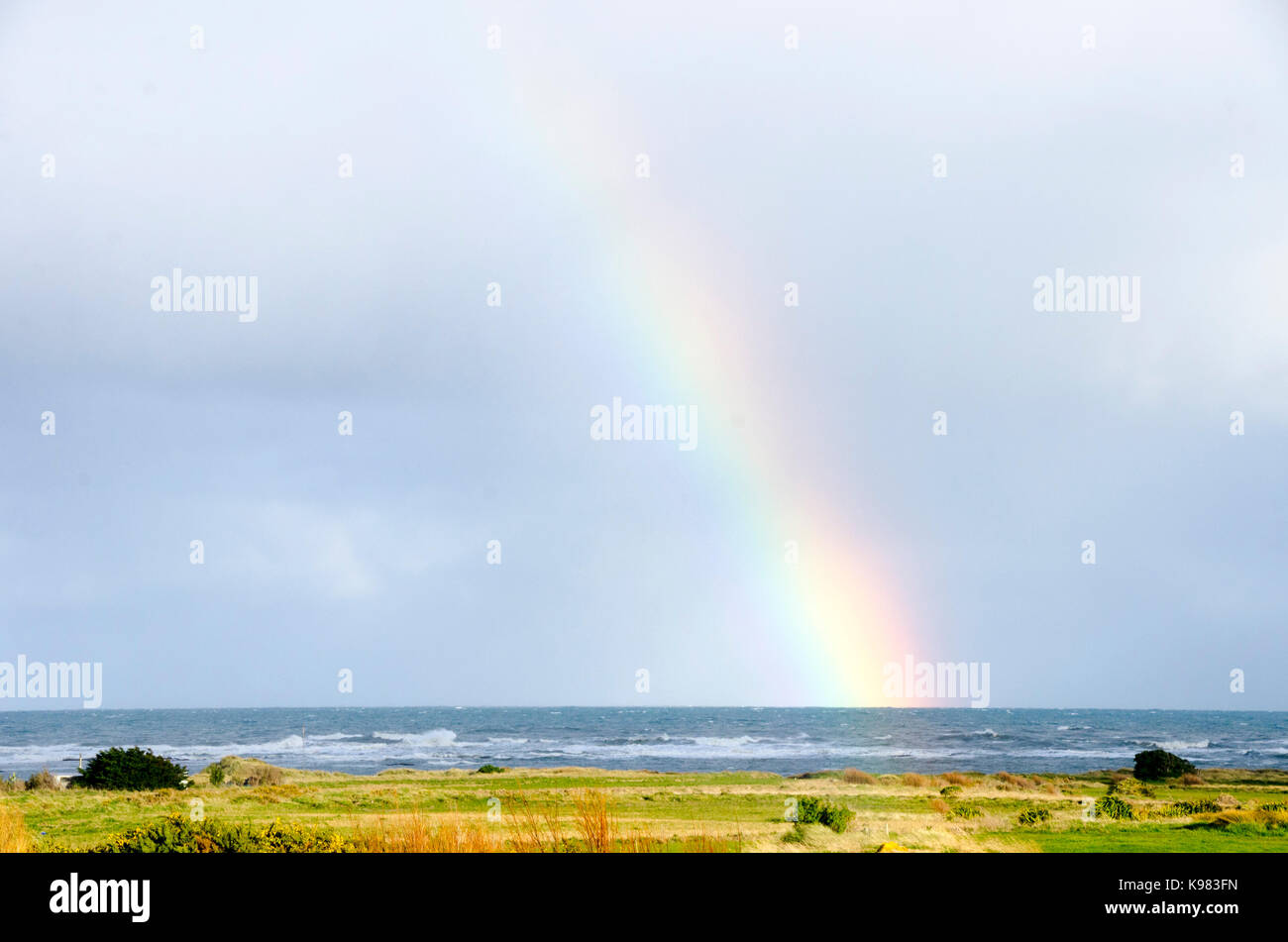 Rainbow over sea, Flat Point, Wairarapa, North Island, New Zealand ...