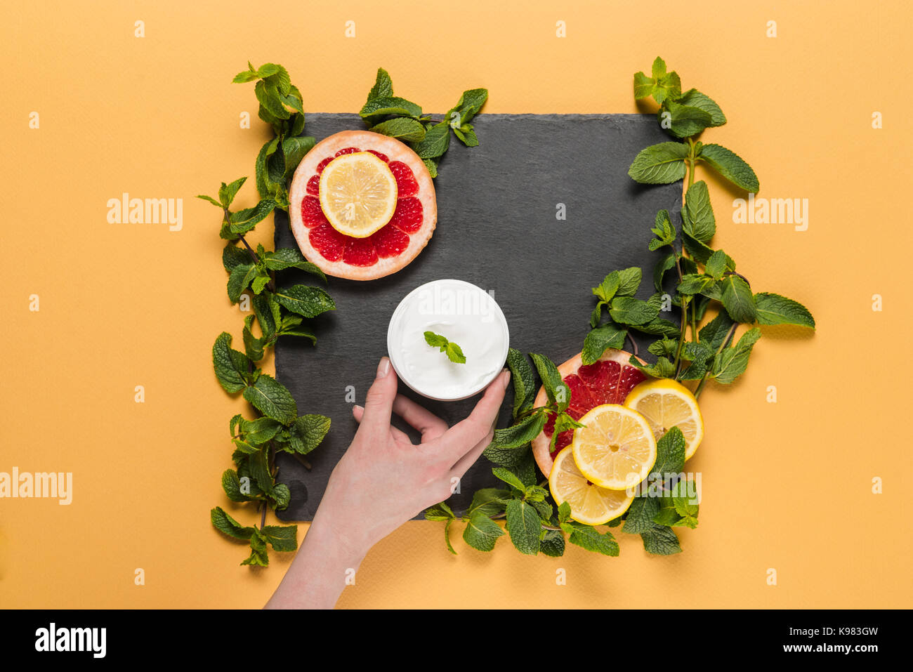 hand with citrus cream Stock Photo - Alamy