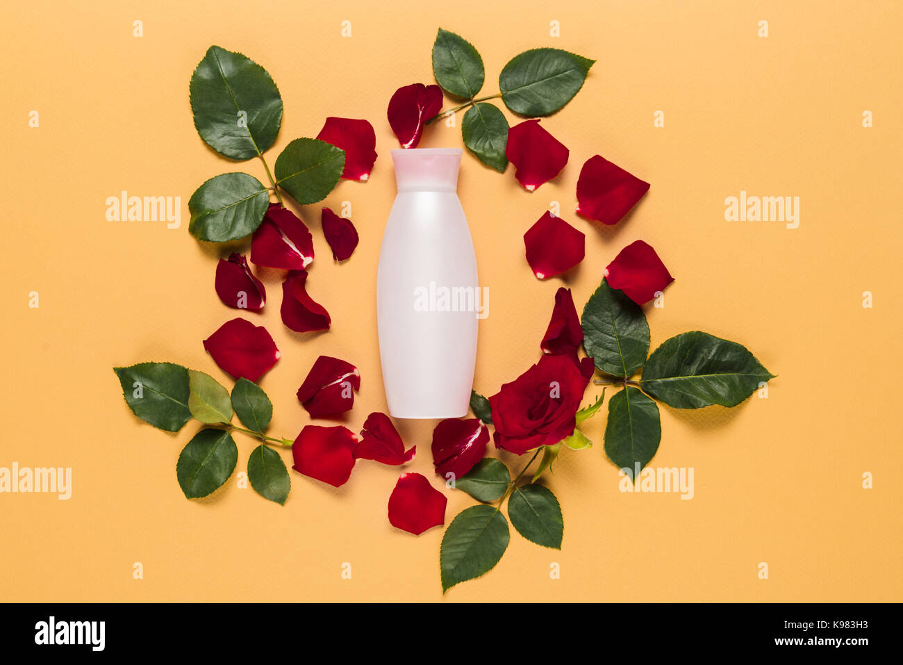 lotion in floral frame Stock Photo - Alamy