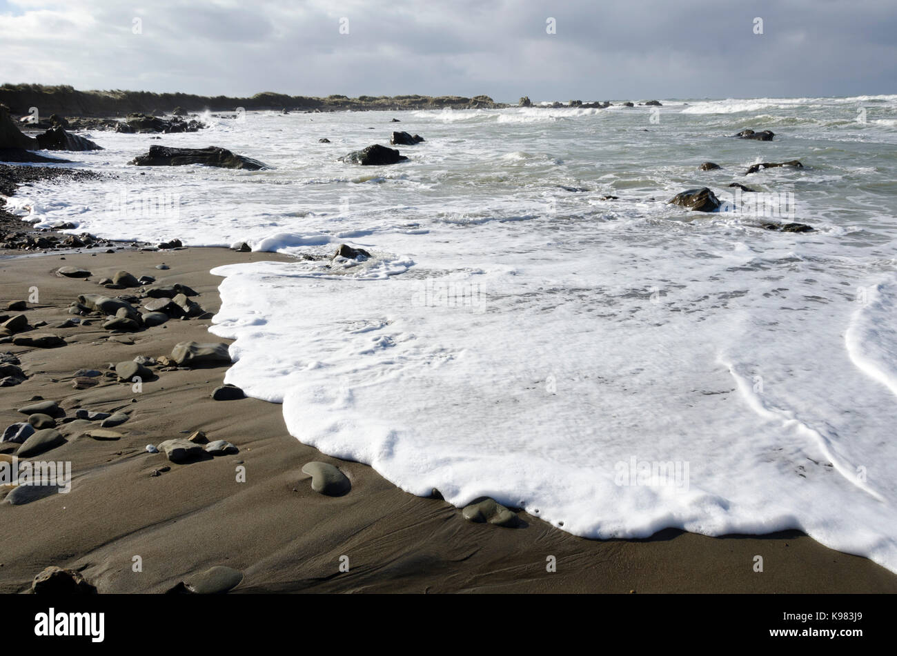 Waves on beach at Glenburn, Wairarapa, North Island, New Zealand Stock ...