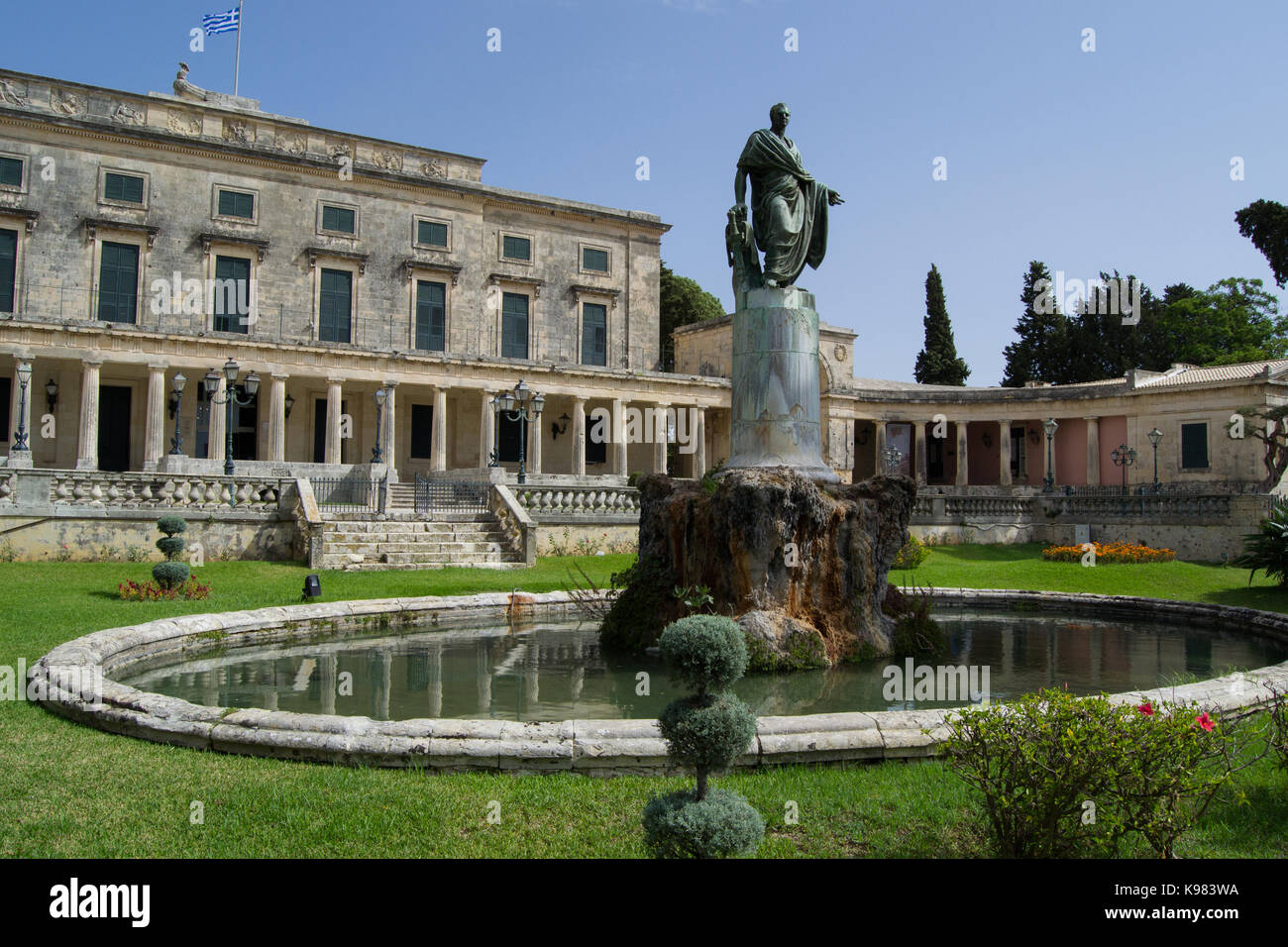 building with a sculpture and a fountain in the courtyard of Corfu ...