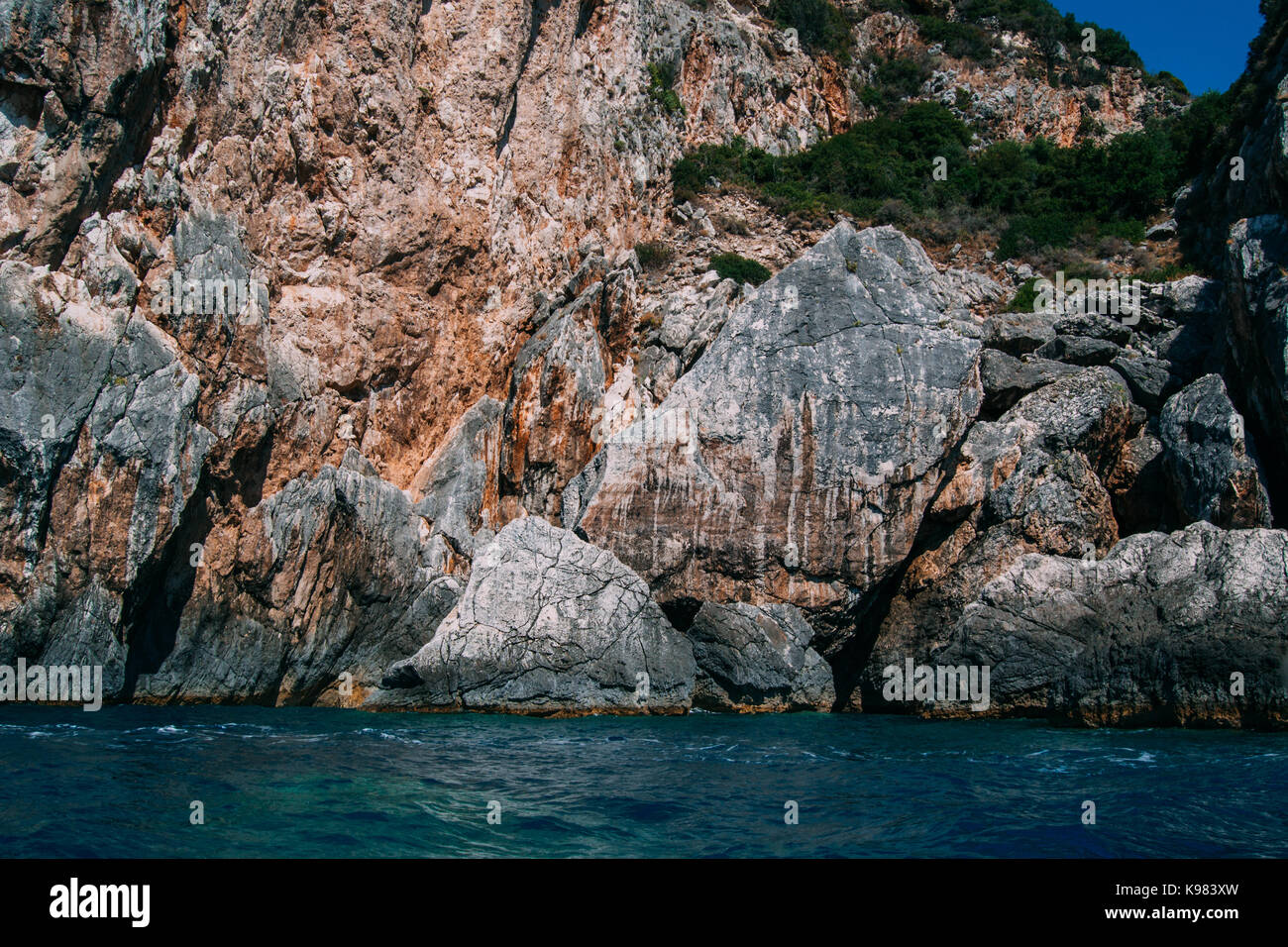 blue sea and the rocks of Corfu, Greece Stock Photo - Alamy