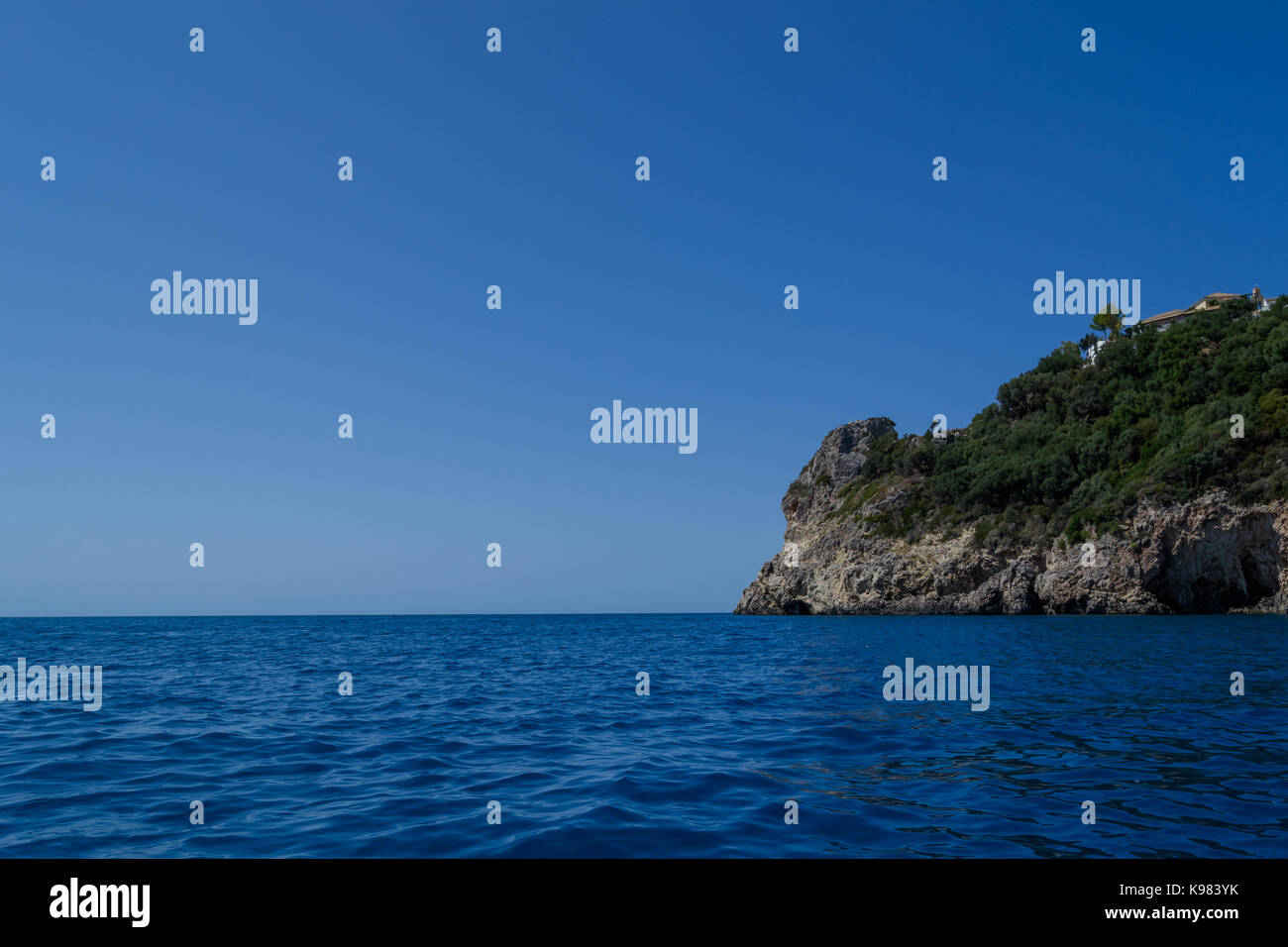 blue sea and the rocks of Corfu, Greece Stock Photo - Alamy