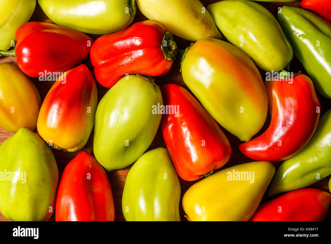 Colorful bell peppers as a natural background Stock Photo - Alamy