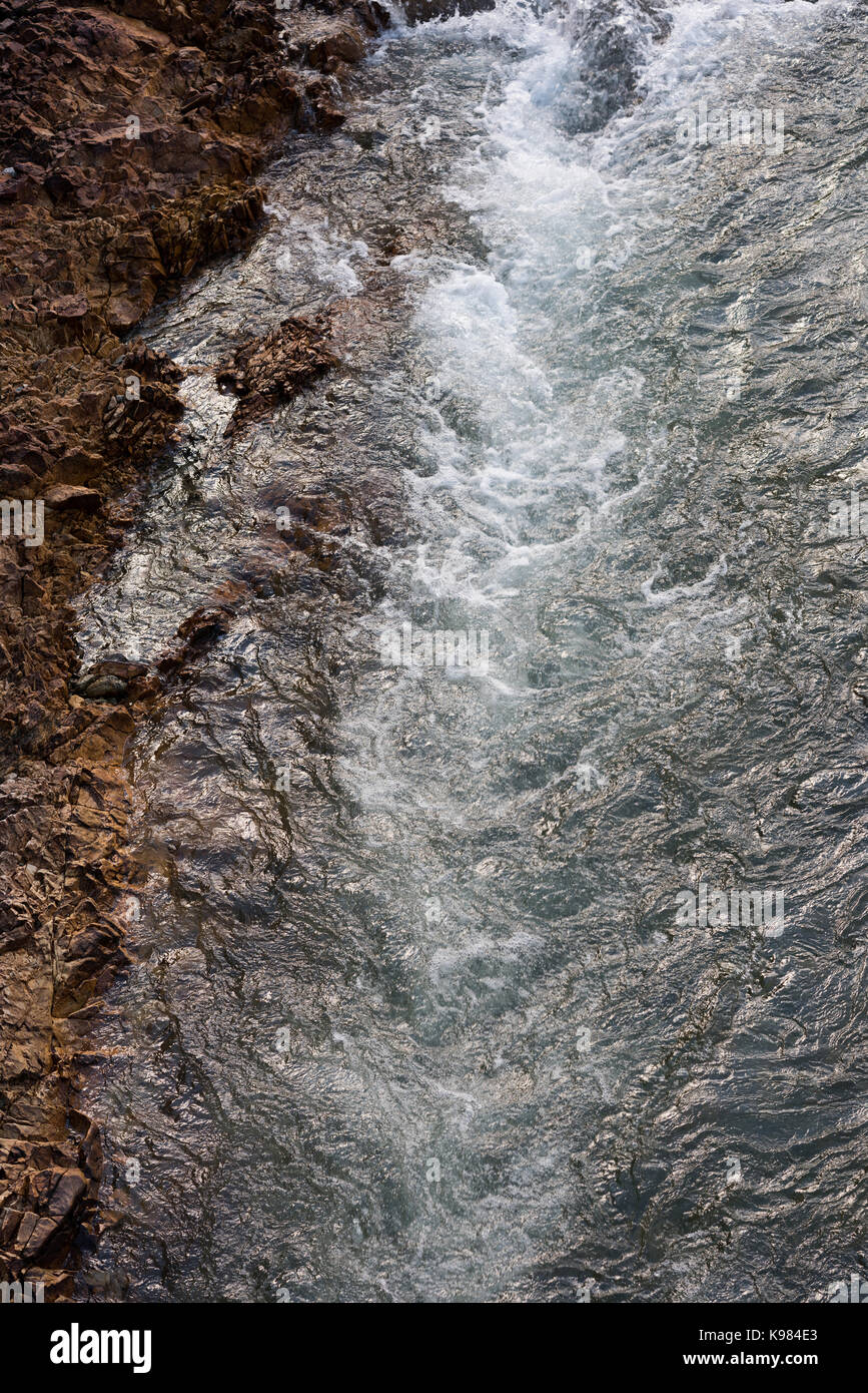 Close-up of river flowing in forest Stock Photo - Alamy