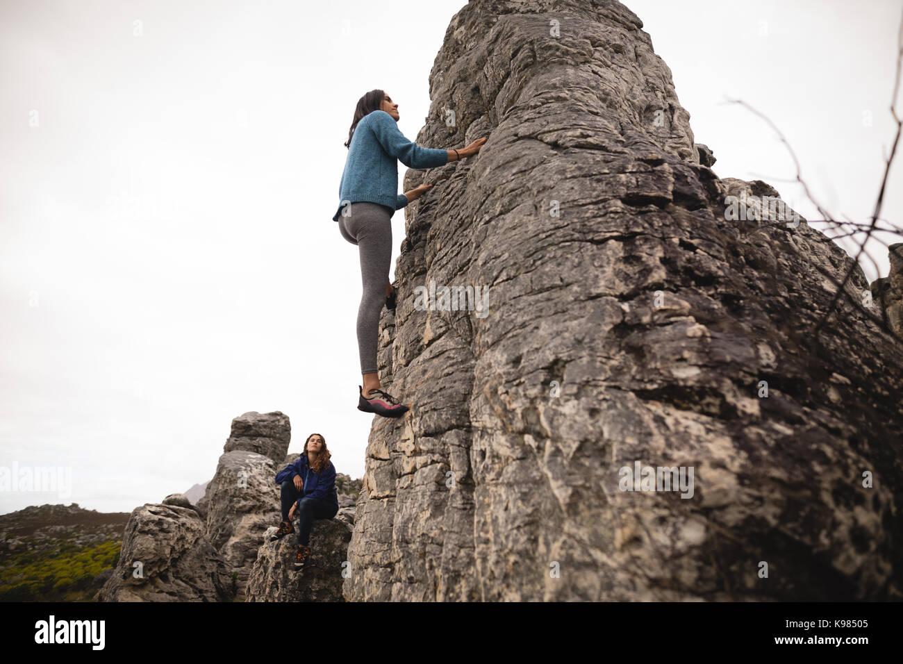 Woman by cliff hi-res stock photography and images - Alamy