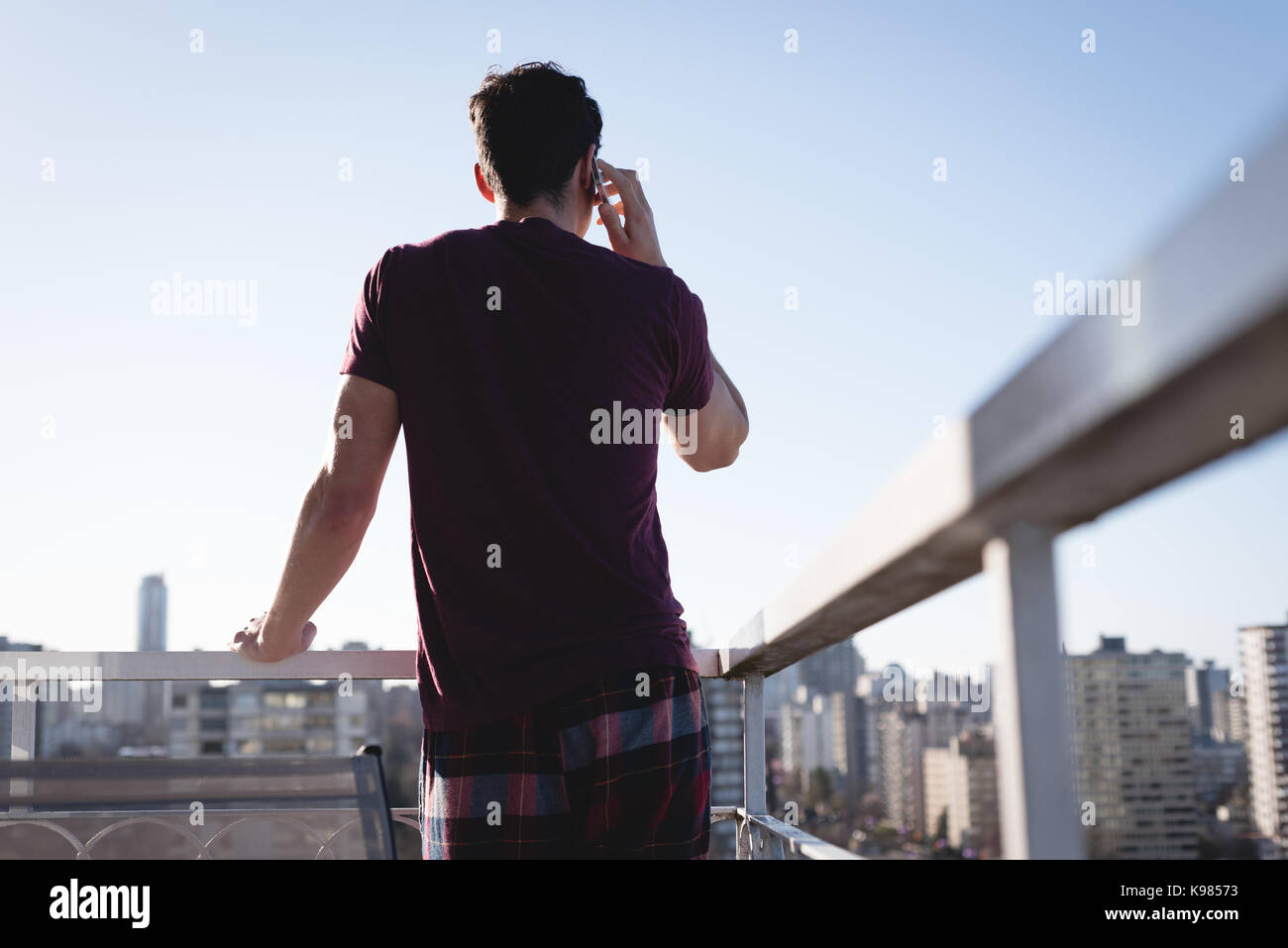 Man mobile rear view hi-res stock photography and images - Alamy