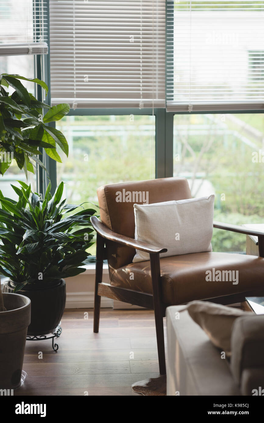 Empty chair in the living room at home Stock Photo - Alamy