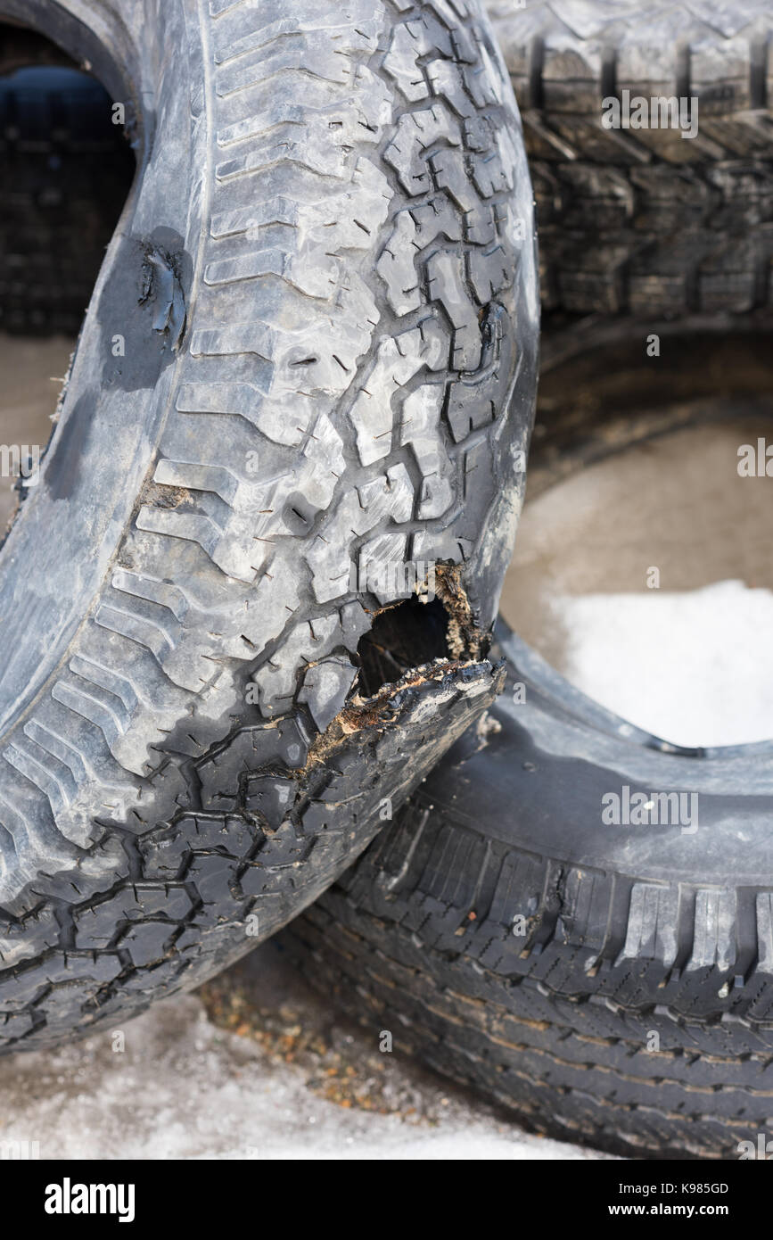 Close-up of torn tyres Stock Photo - Alamy
