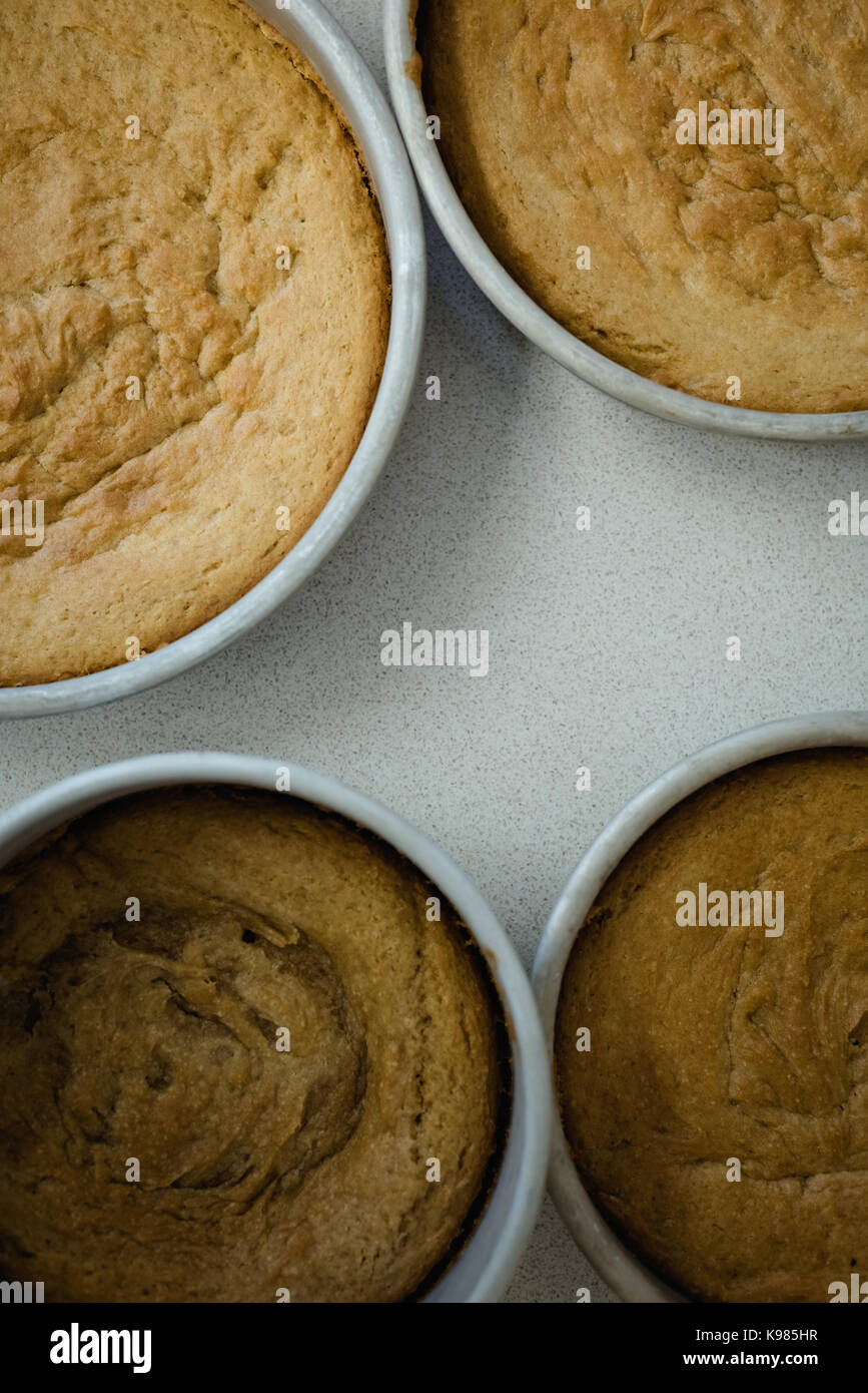 Overhead of cake in baking container Stock Photo - Alamy