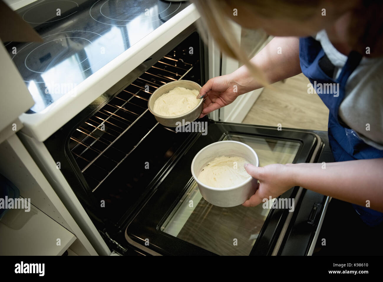 Pretty woman preparing cake hi-res stock photography and images - Alamy