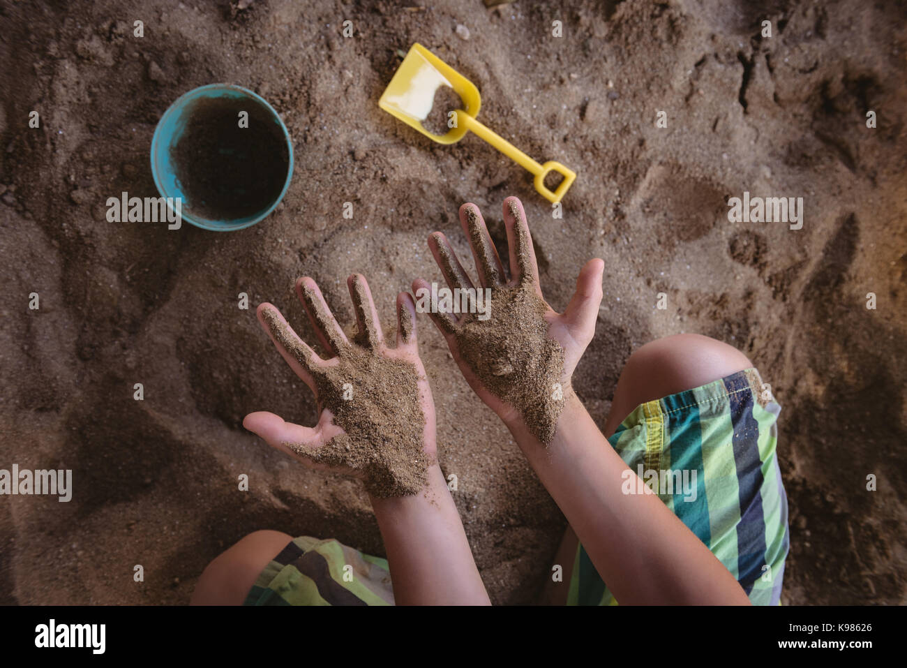 Boy bucket sand hi-res stock photography and images - Alamy