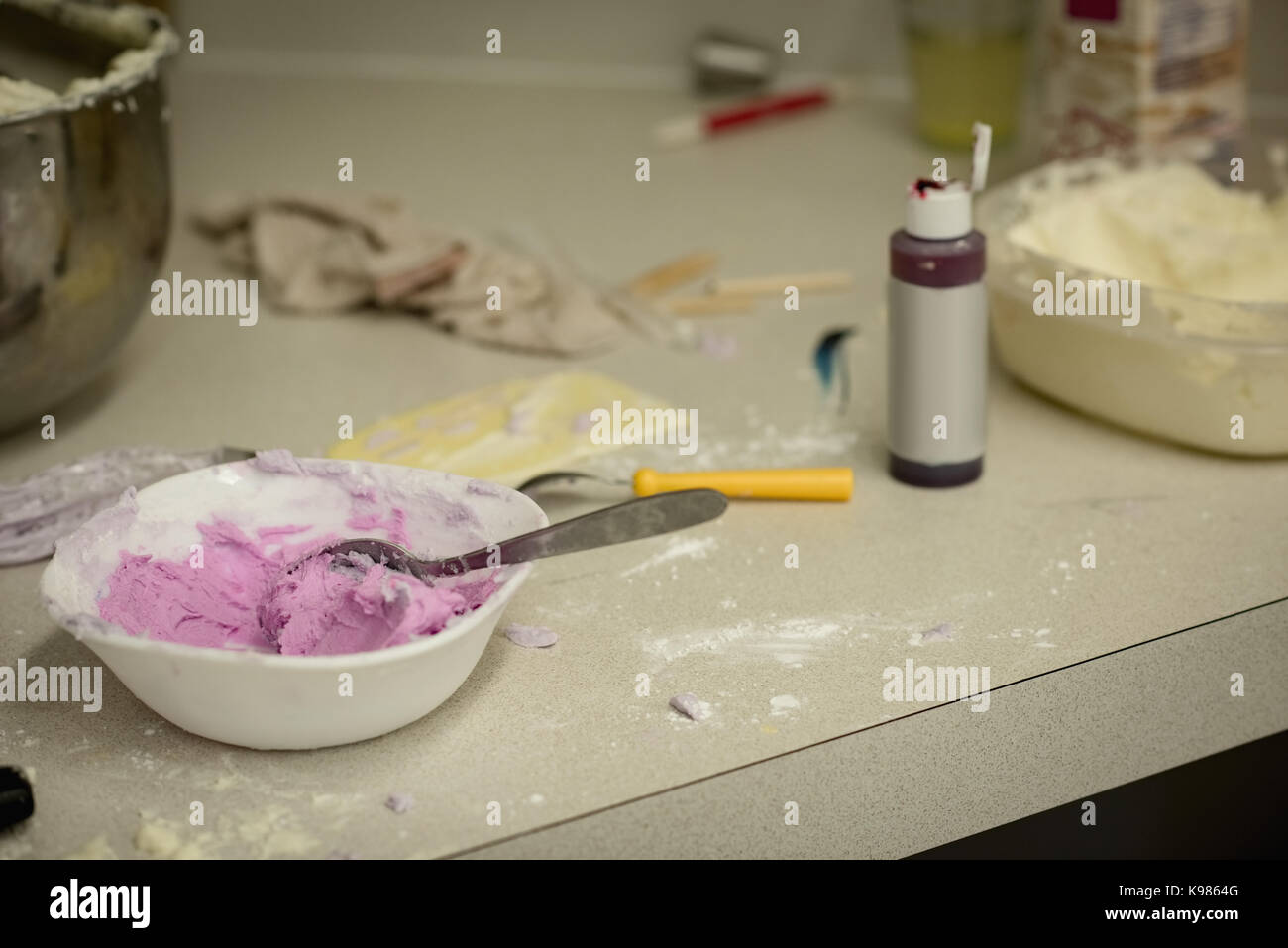 Whipped cream in bowl with spoon in kitchen counter Stock Photo - Alamy
