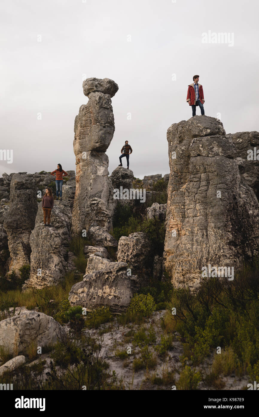 Female standing cliff top hi-res stock photography and images - Alamy