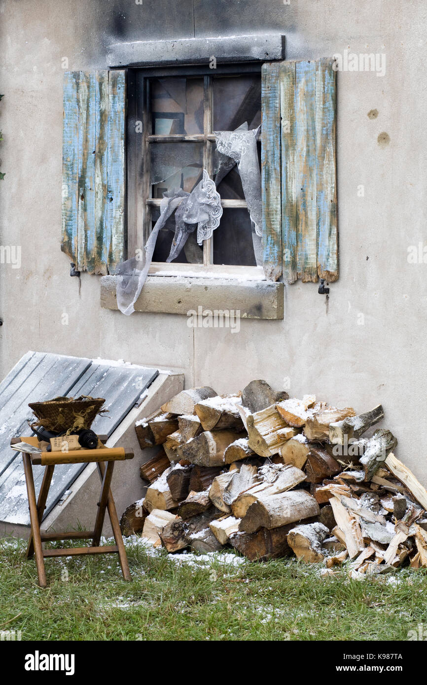 old cottage with wood pile and broken window Stock Photo - Alamy