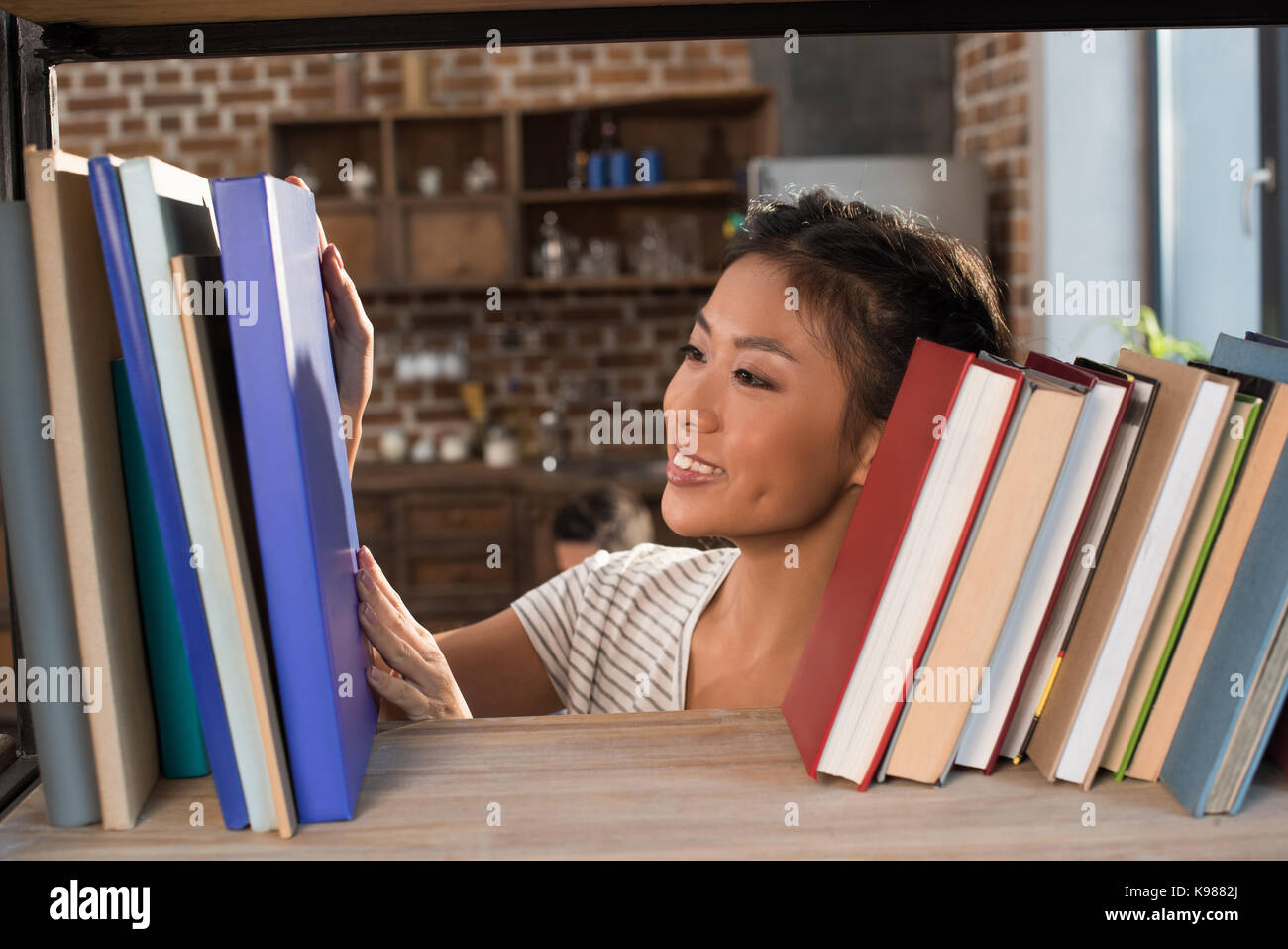asian female student with books Stock Photo - Alamy